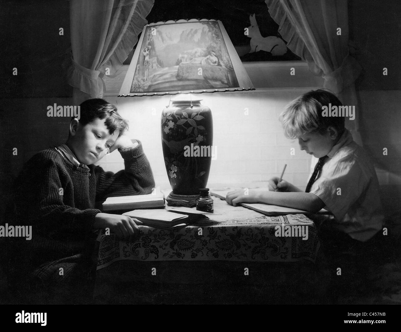 Students doing their homework, 1932 Stock Photo - Alamy