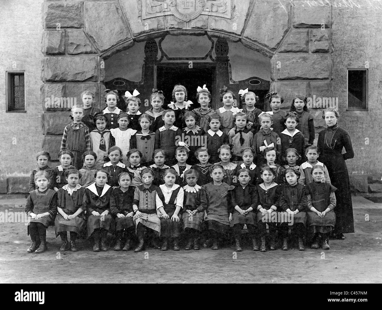 Girl teaching Black and White Stock Photos & Images - Alamy