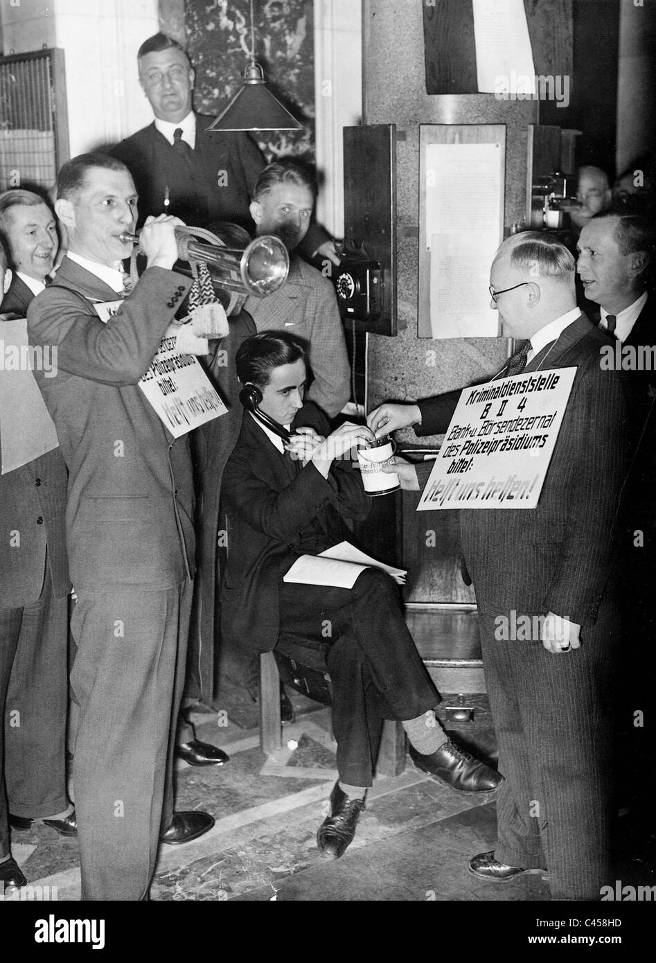 Police collect money, 1934 Stock Photo - Alamy