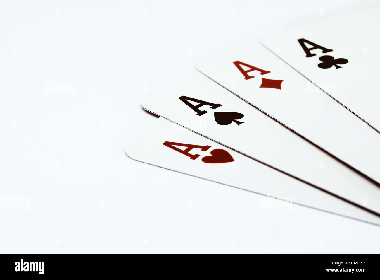 Four aces isolated on white background Stock Photo - Alamy
