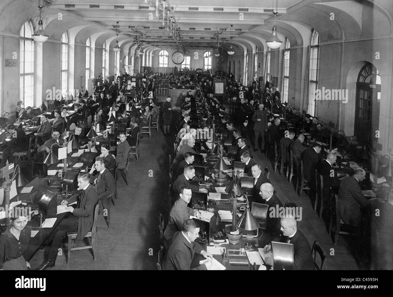 Telegram department in a post office in Berlin, 1920 Stock Photo - Alamy