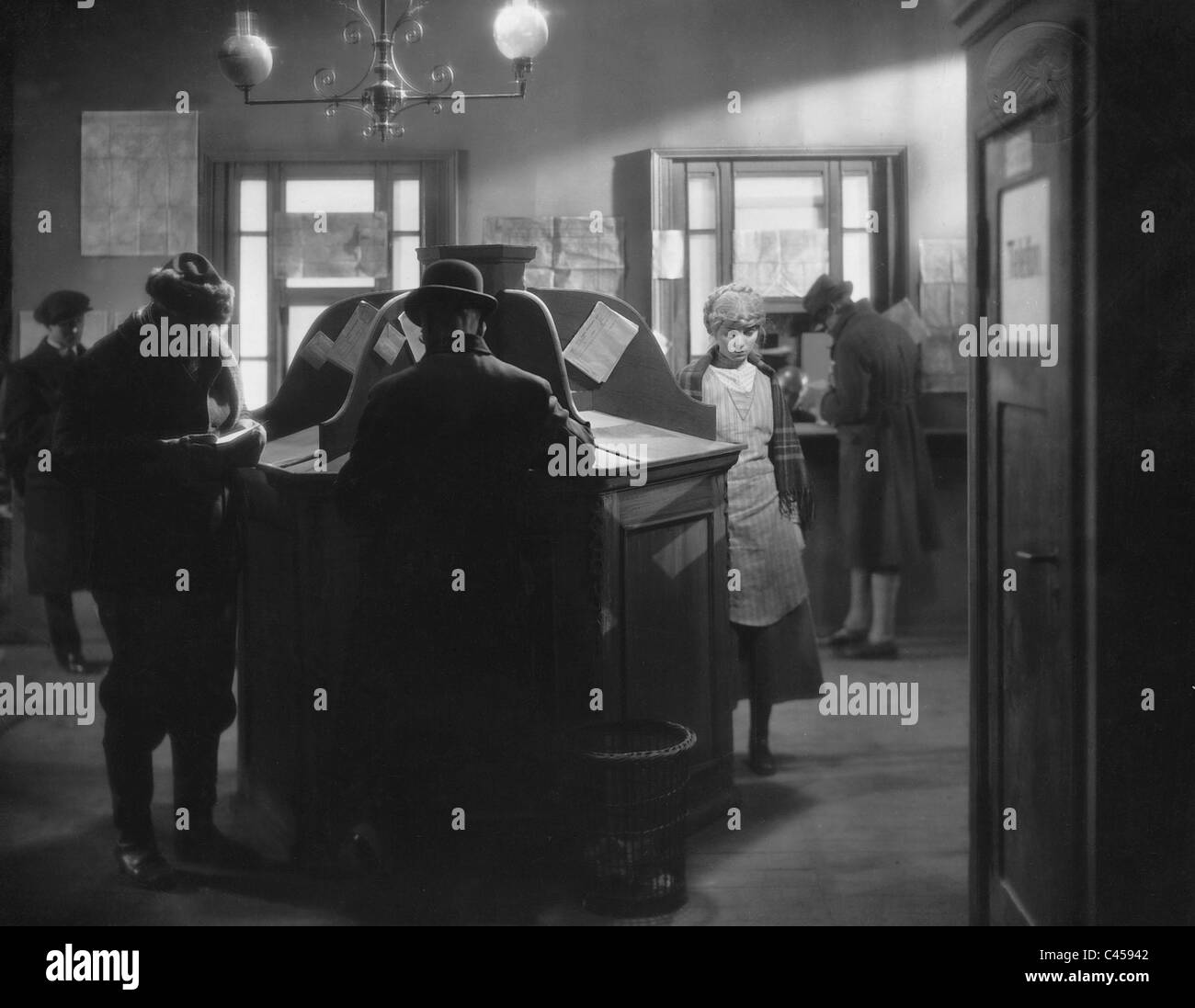 Customers in a post office Stock Photo - Alamy