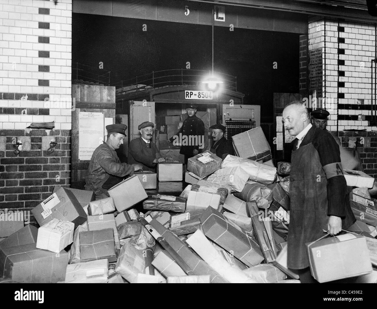 Parcel post office in the 30s Stock Photo - Alamy