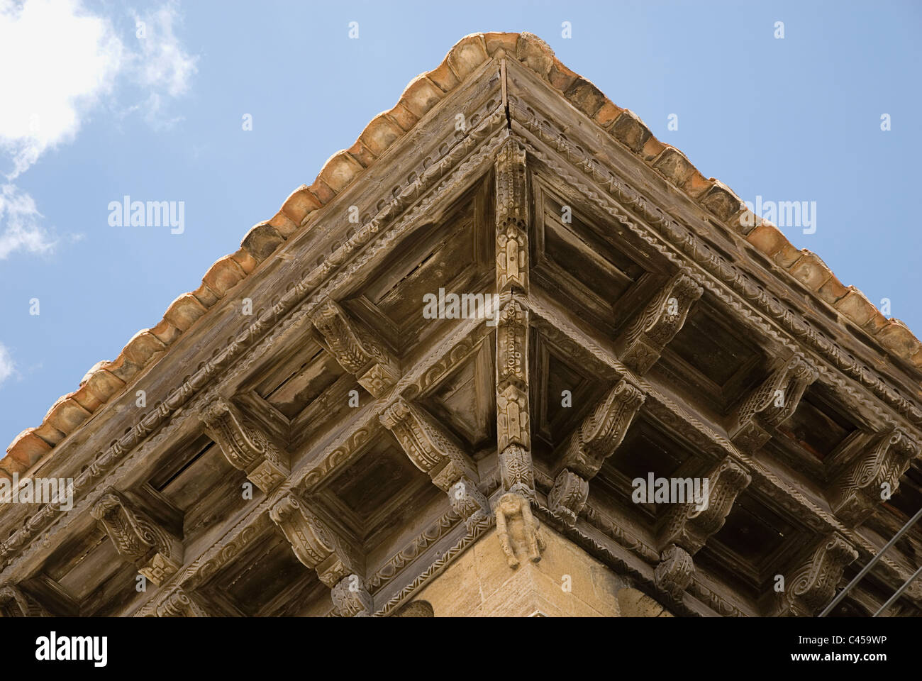 Spain, Maestrazgo, La Iglesuela del Cid, Carved wooden building eaves ...