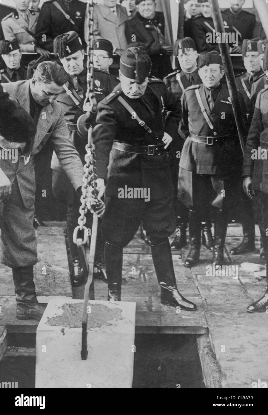Benito Mussolini during the laying of the foundation stone for the film ...
