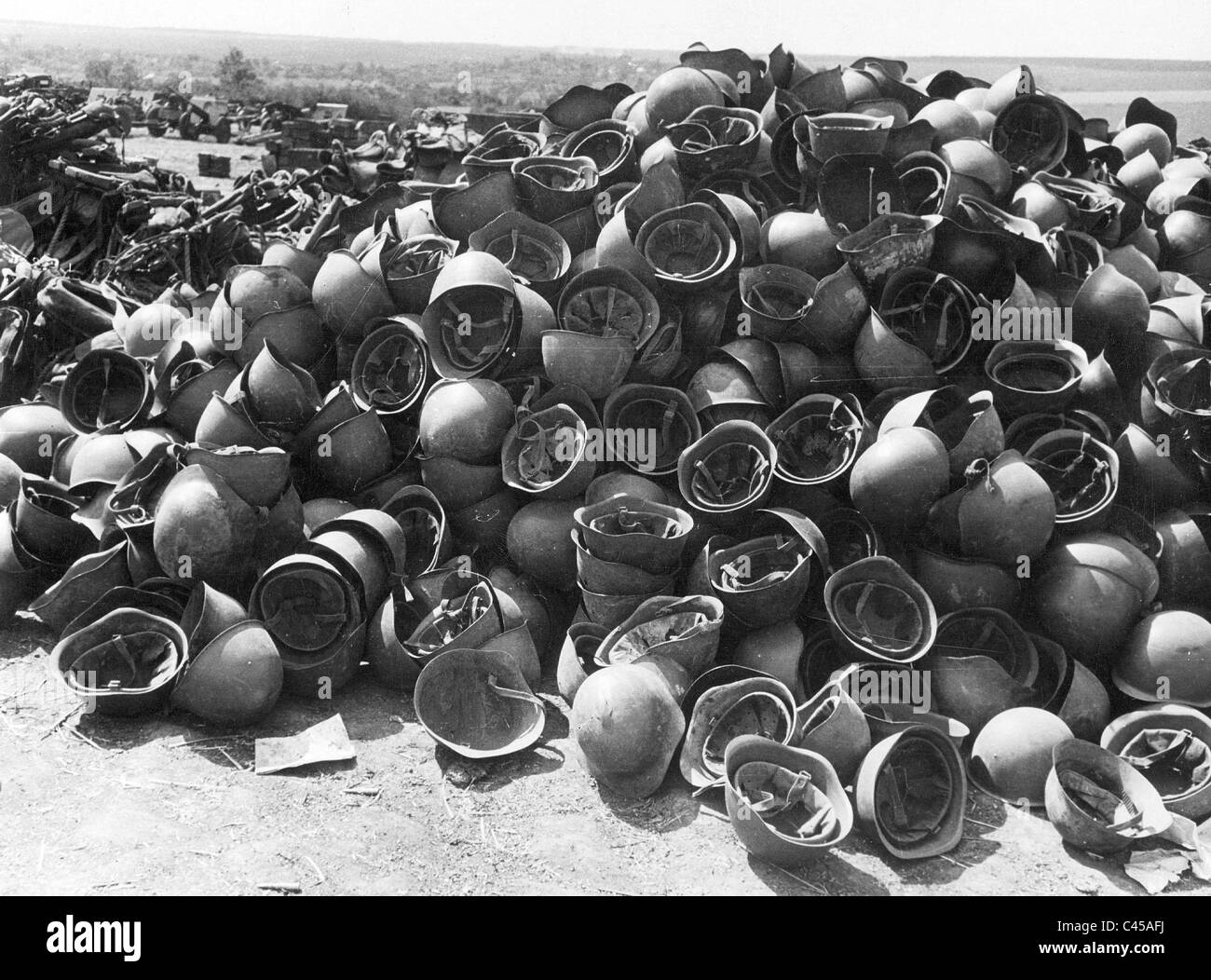 Helmets of captured Russian soldiers on the Eastern front, 1941 Stock ...