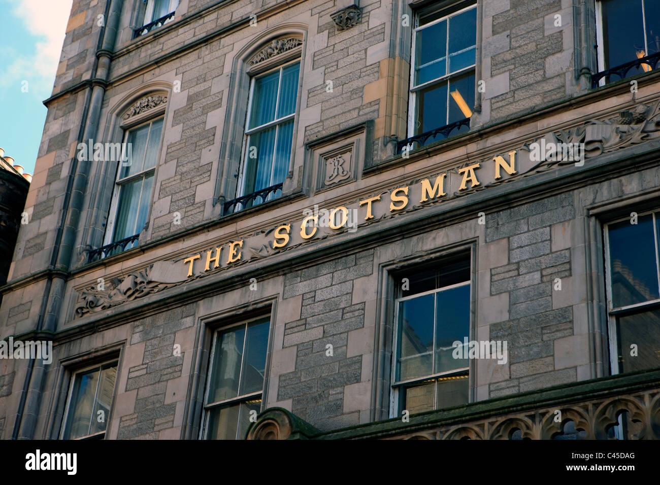 The Scotsman on the side of an Edinburgh building in Cockburn Street ...