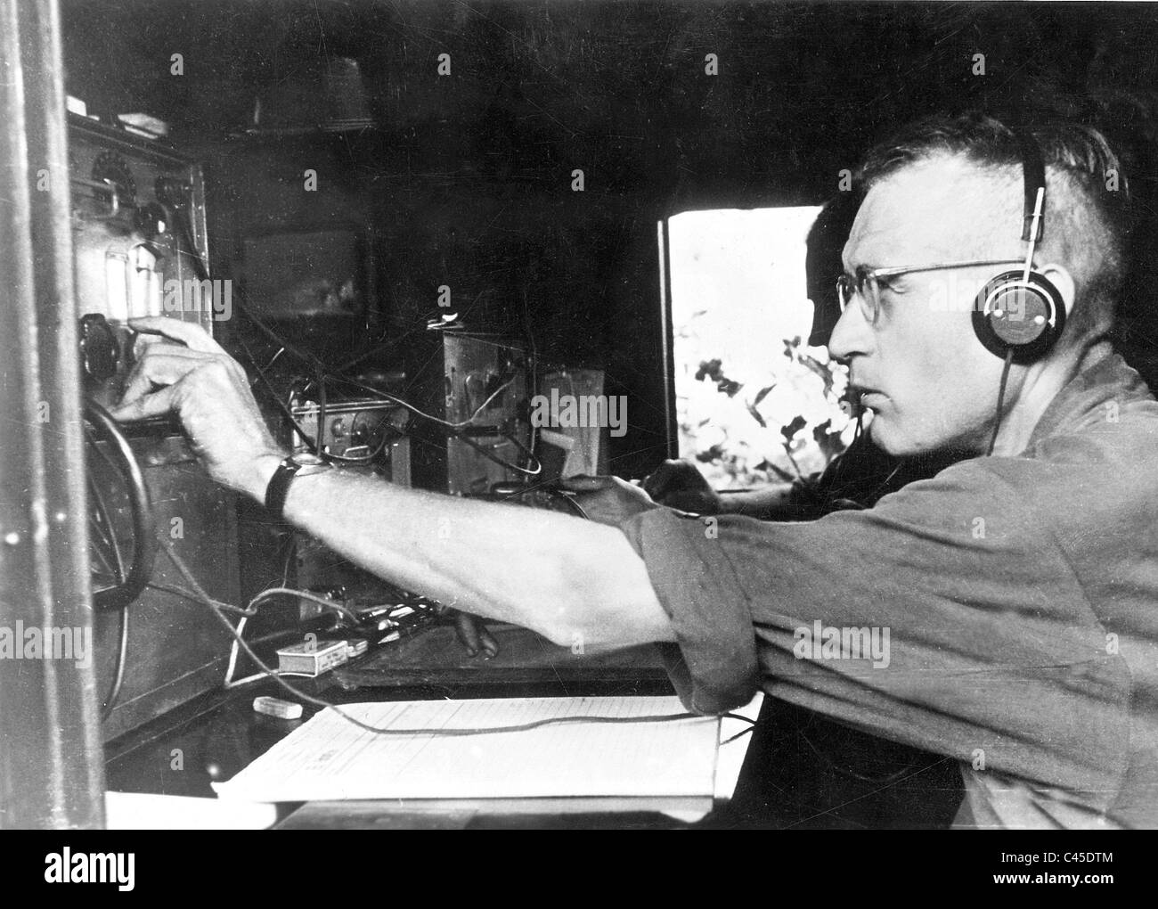 Radio operators on the radio equipment in the radio car Stock Photo - Alamy