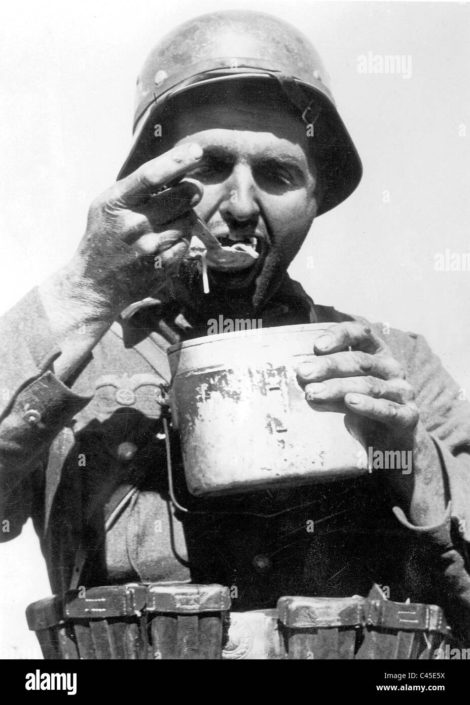 German soldier eats Stock Photo - Alamy