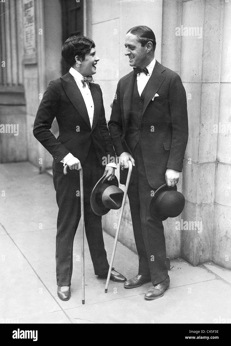 Man walking to woman Black and White Stock Photos & Images - Alamy