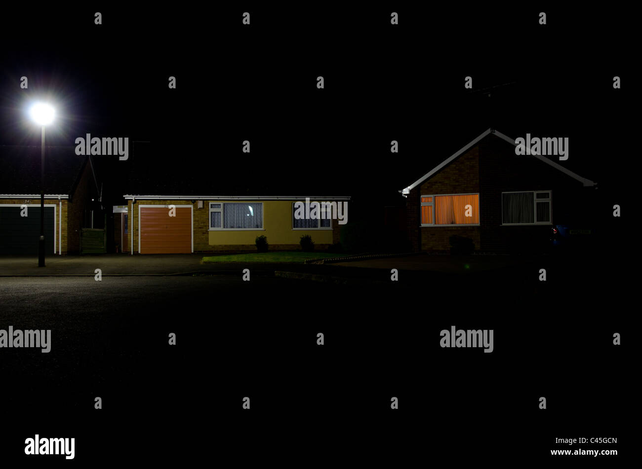 Suburban houses at night Stock Photo - Alamy