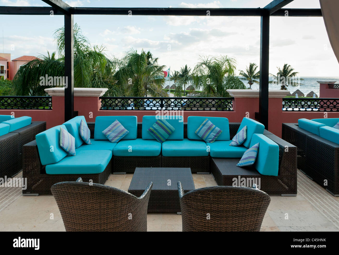Colorful outdoor seating on an upper deck of a vacation resort along ...