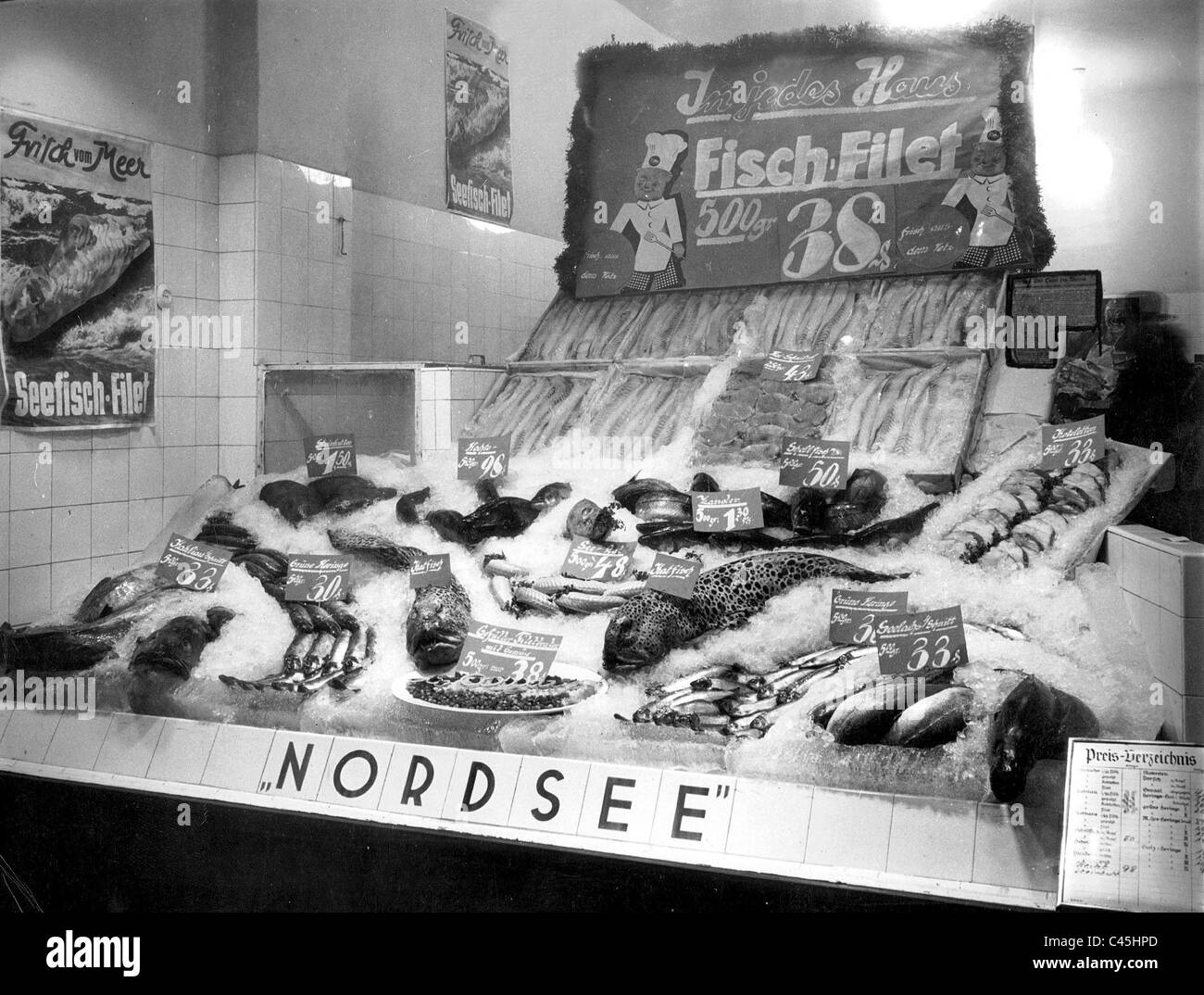 Shop window of a branch of the 'Nordsee' chain , 1937 Stock Photo - Alamy