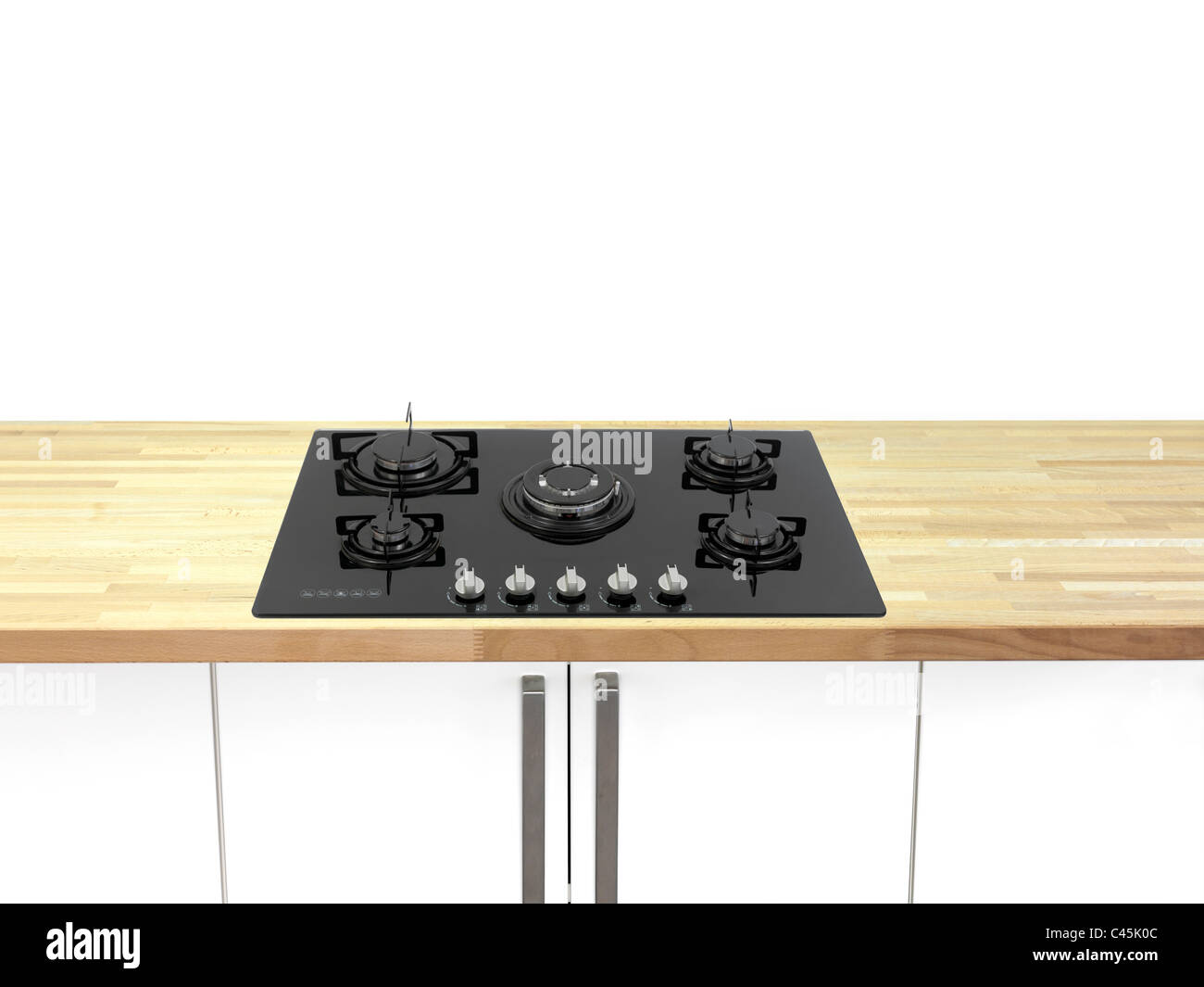 A kitchen cooktop on a kitchen bench Stock Photo - Alamy