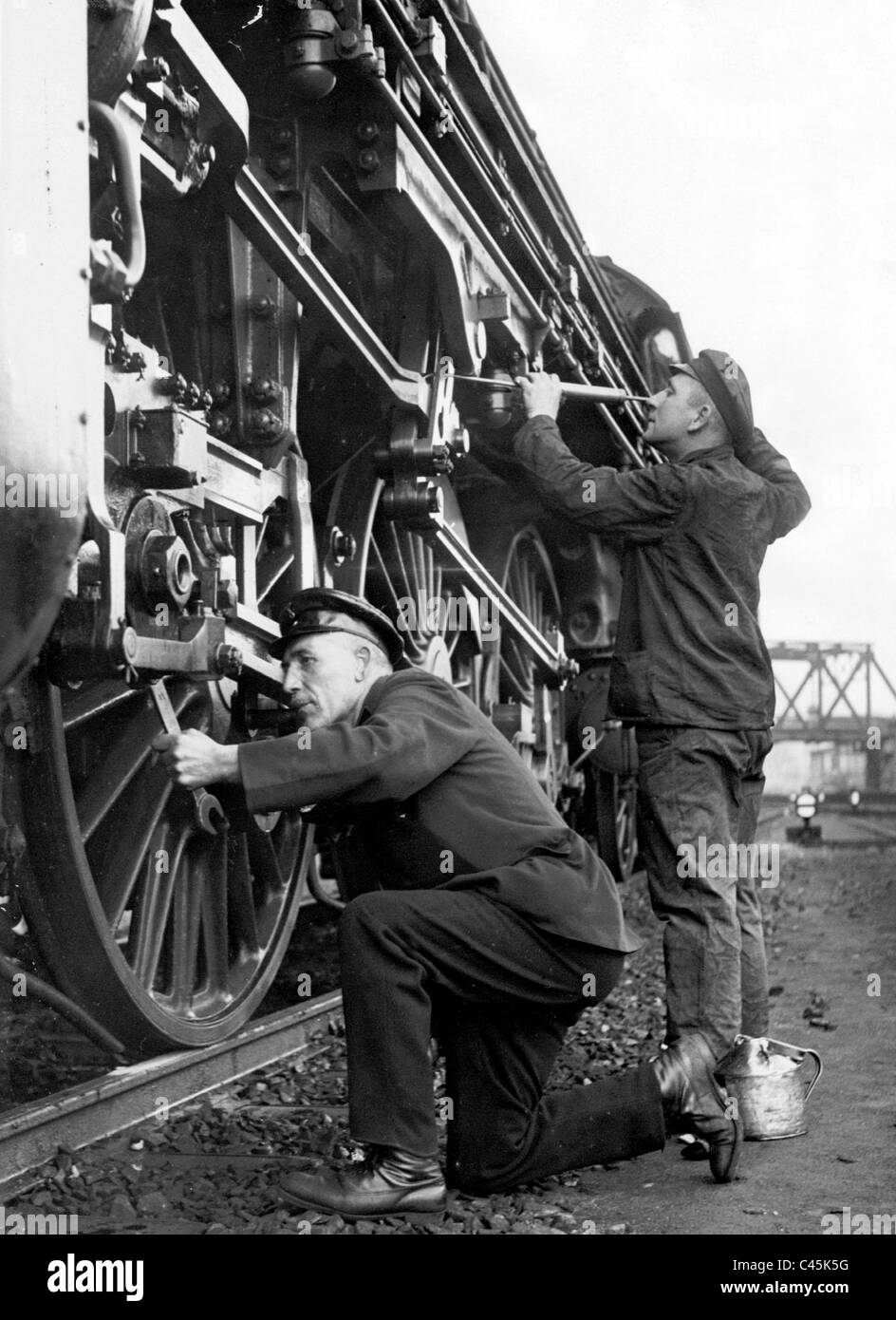 Maintenance of a steam locomotive, 1936 Stock Photo - Alamy