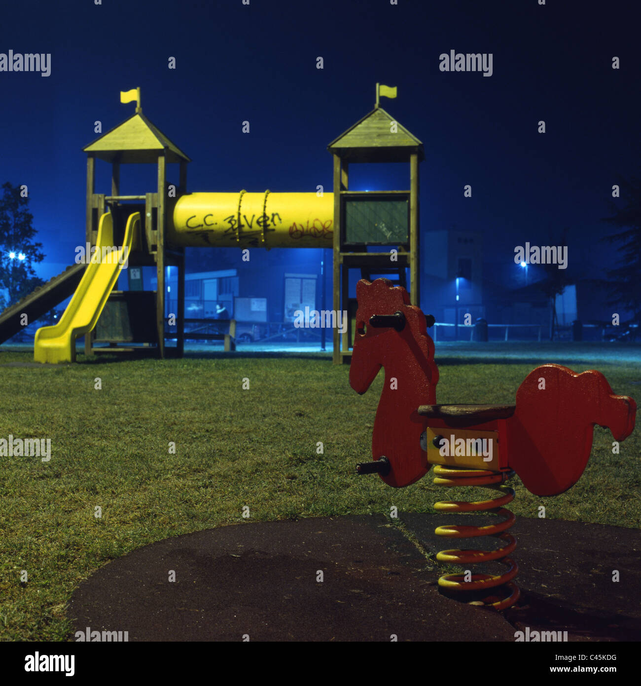 a quiet playground in a park at night Stock Photo - Alamy