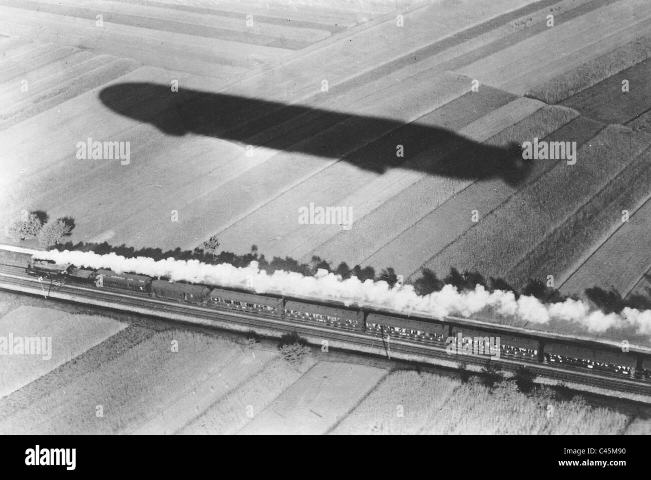 Race between an express train and an airship, 1911 Stock Photo - Alamy
