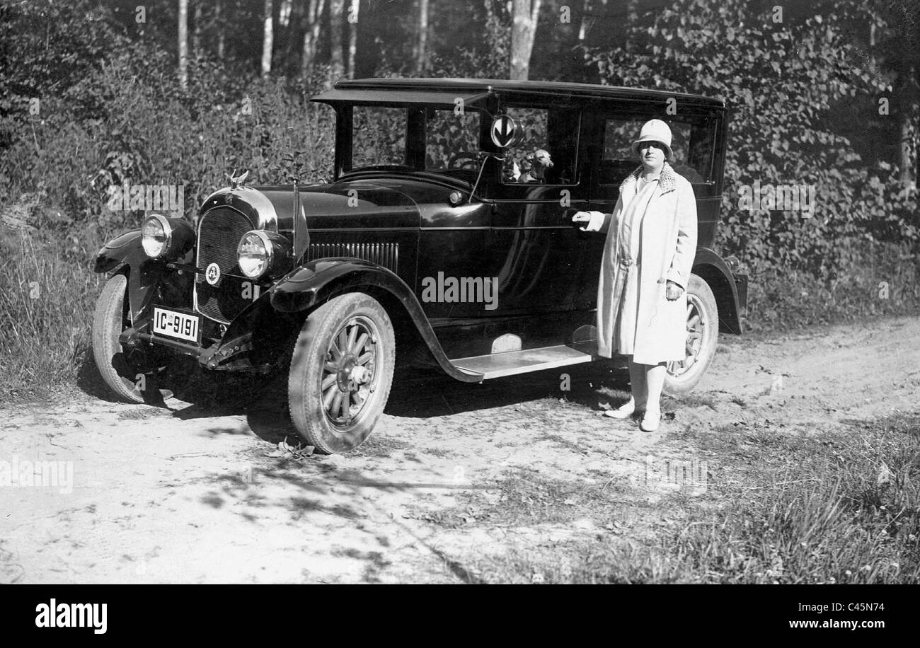 Woman stands next hi-res stock photography and images - Alamy