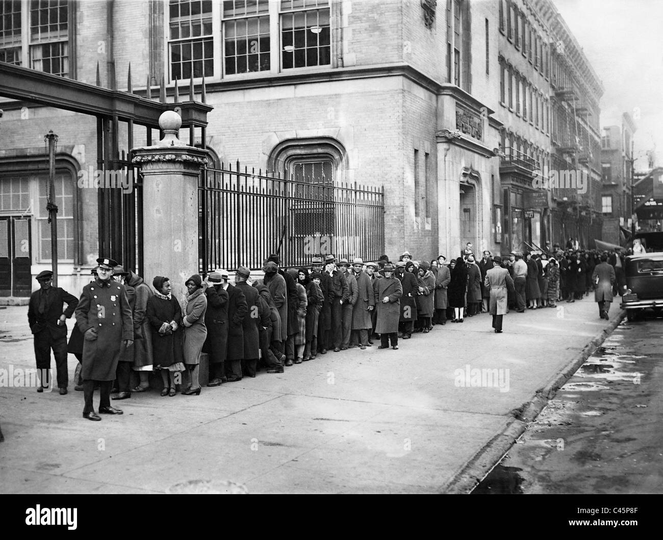 Unemployed people in front of a welfare office Stock Photo - Alamy