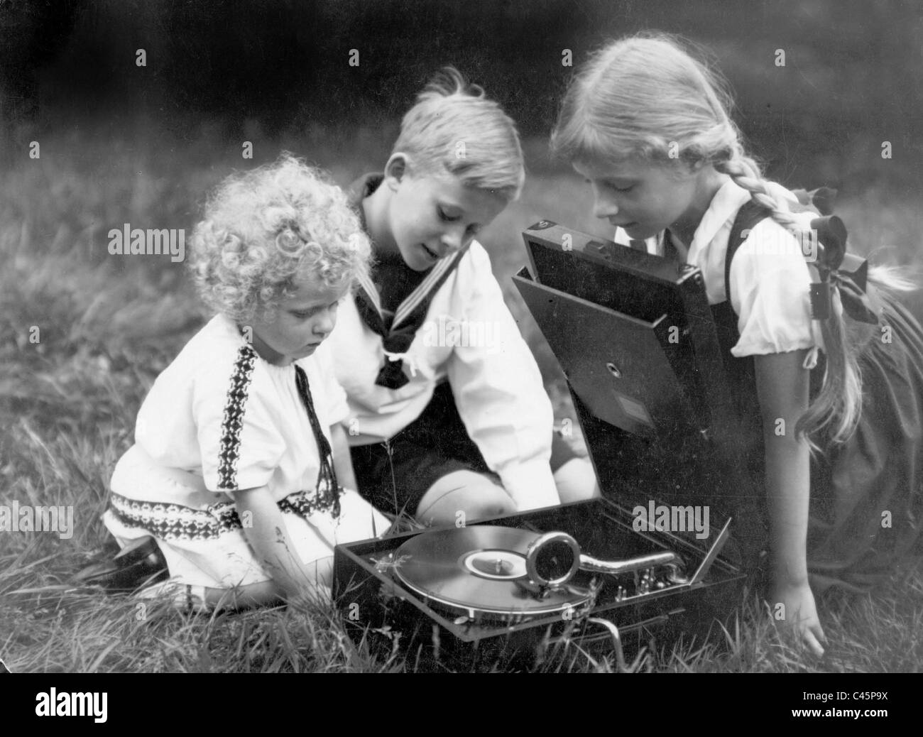 Children on the gramophone, 1935 Stock Photo - Alamy