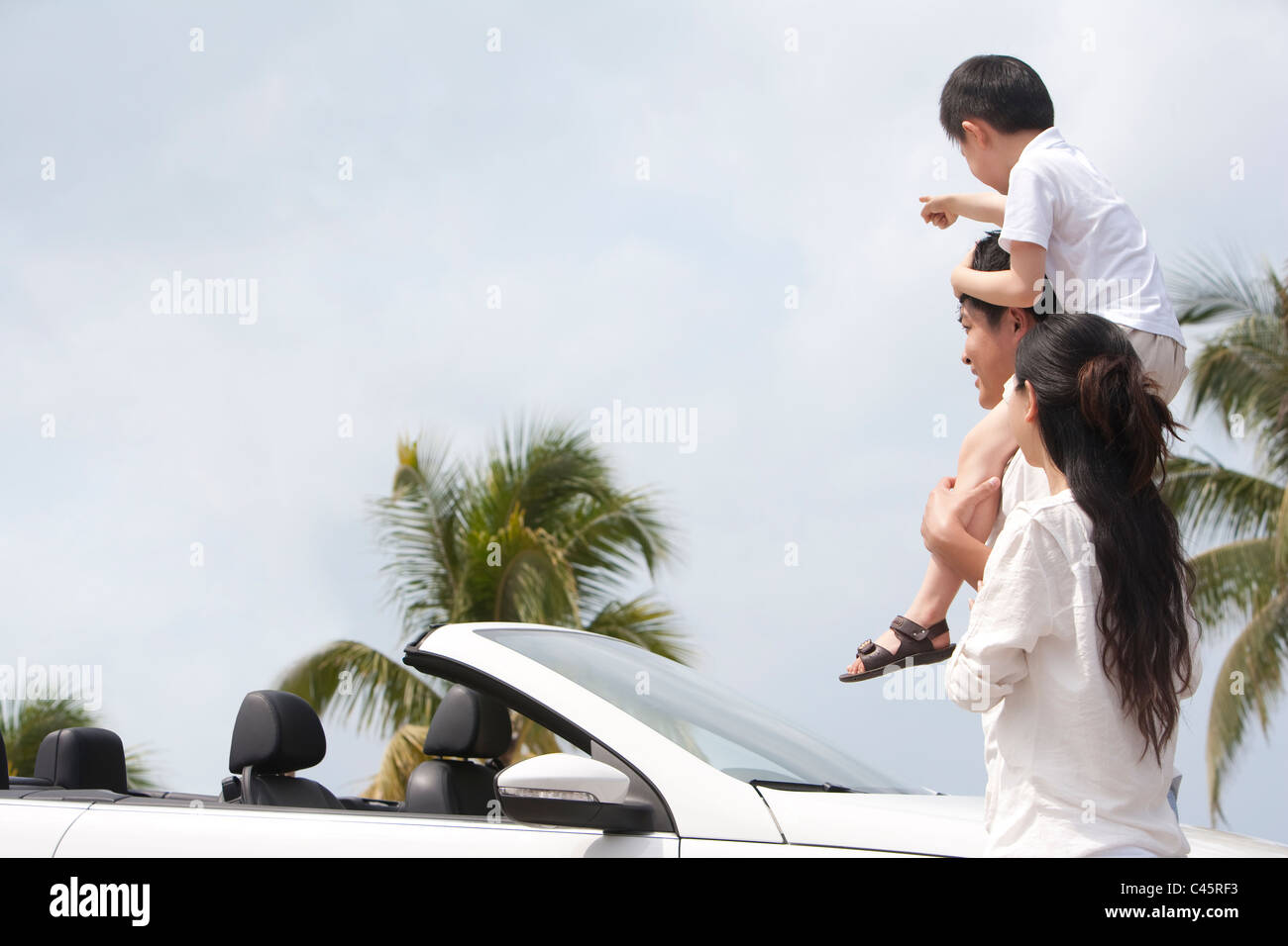 Family Looking at View Stock Photo - Alamy