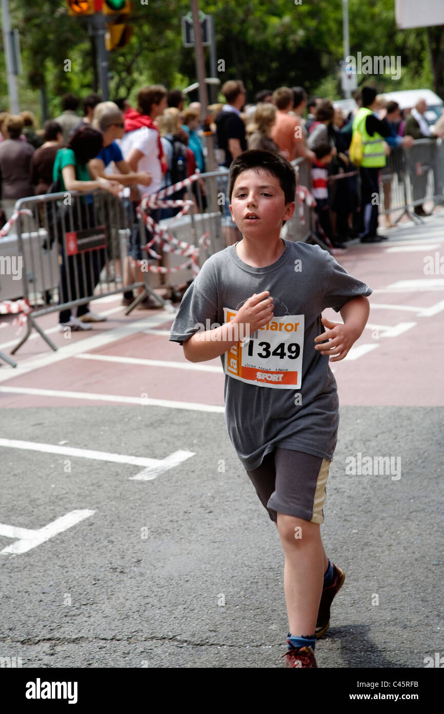 Tired boy running hi-res stock photography and images - Alamy