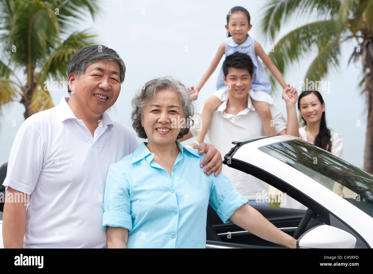 Happy Family on Vacation Stock Photo - Alamy