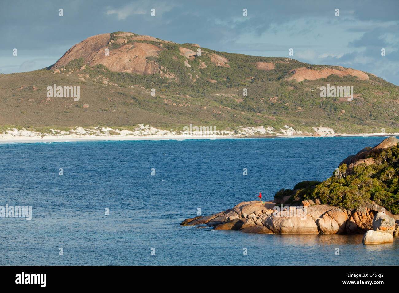 Man fishing from rocks in Lucky Bay. Cape Le Grand National Park ...
