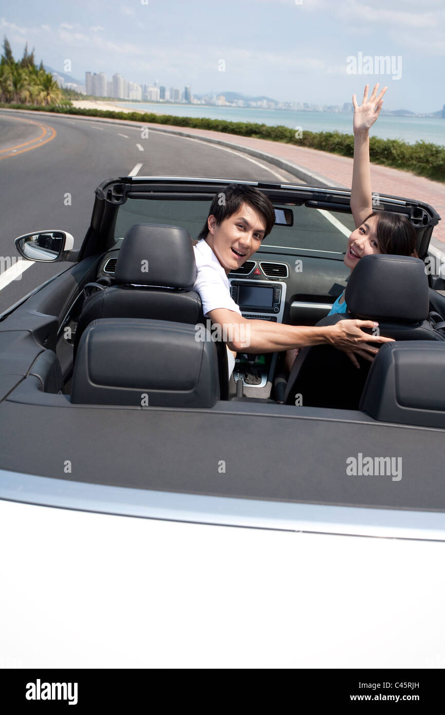 Young People Having Fun in a Convertible Stock Photo - Alamy