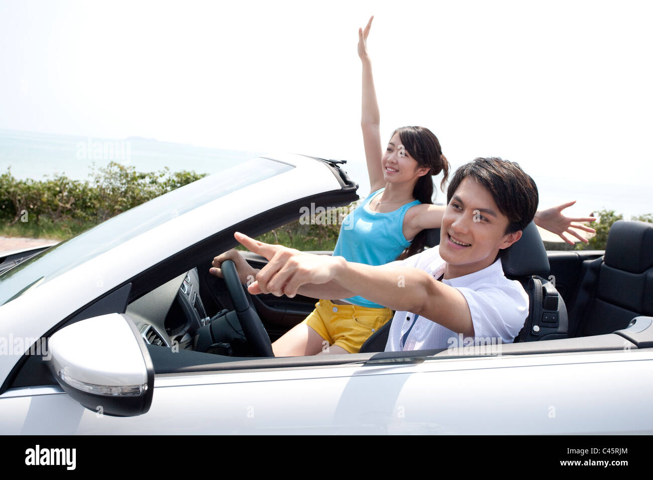 Young People Having Fun in a Convertible Stock Photo - Alamy