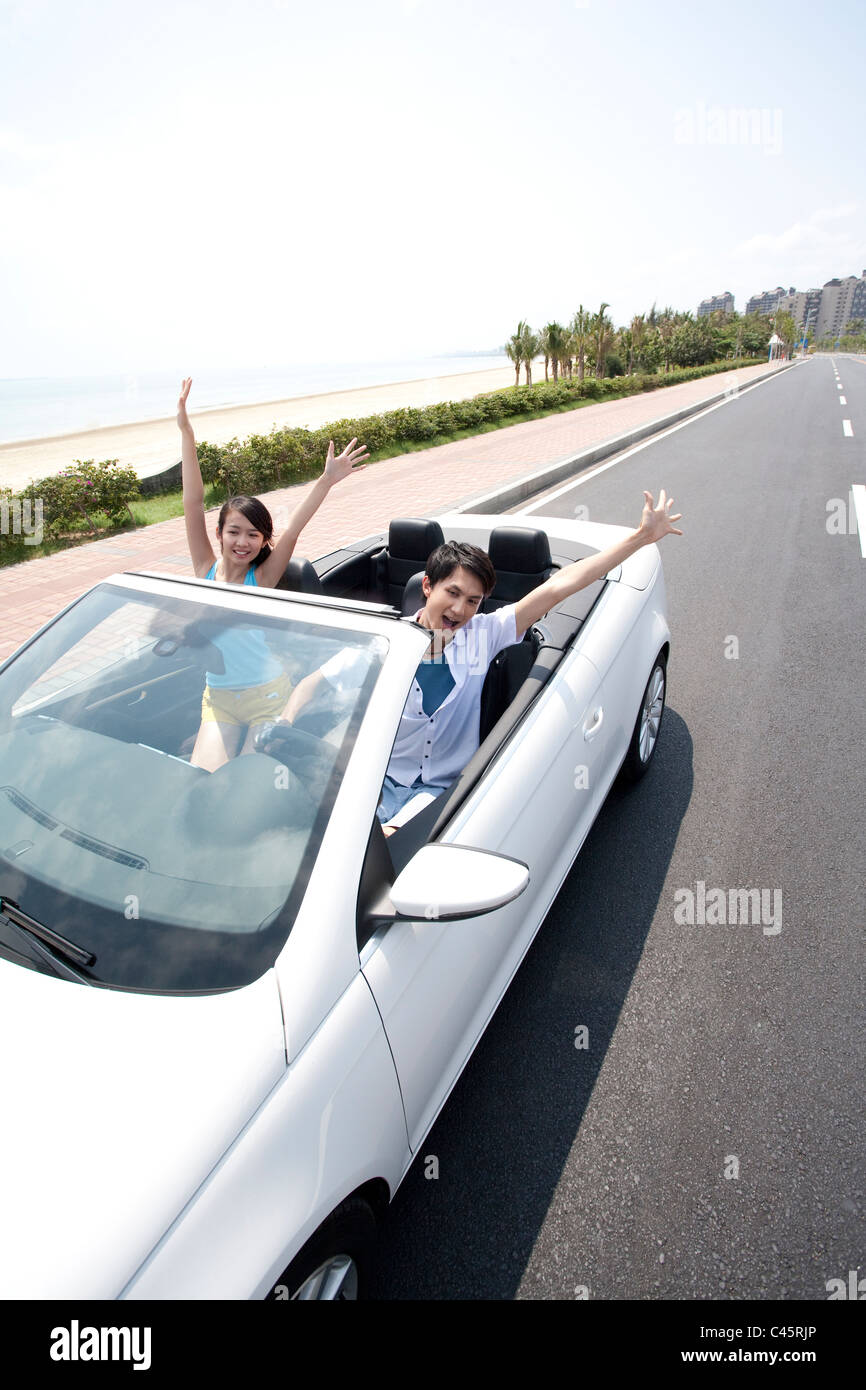 Young People Having Fun in a Convertible Stock Photo - Alamy