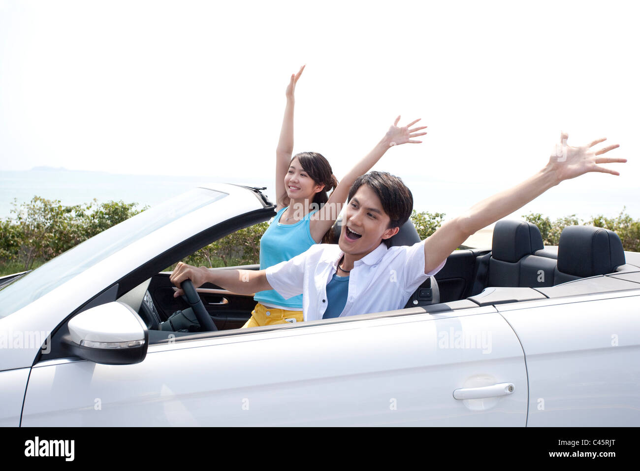 Young People Having Fun in a Convertible Stock Photo - Alamy