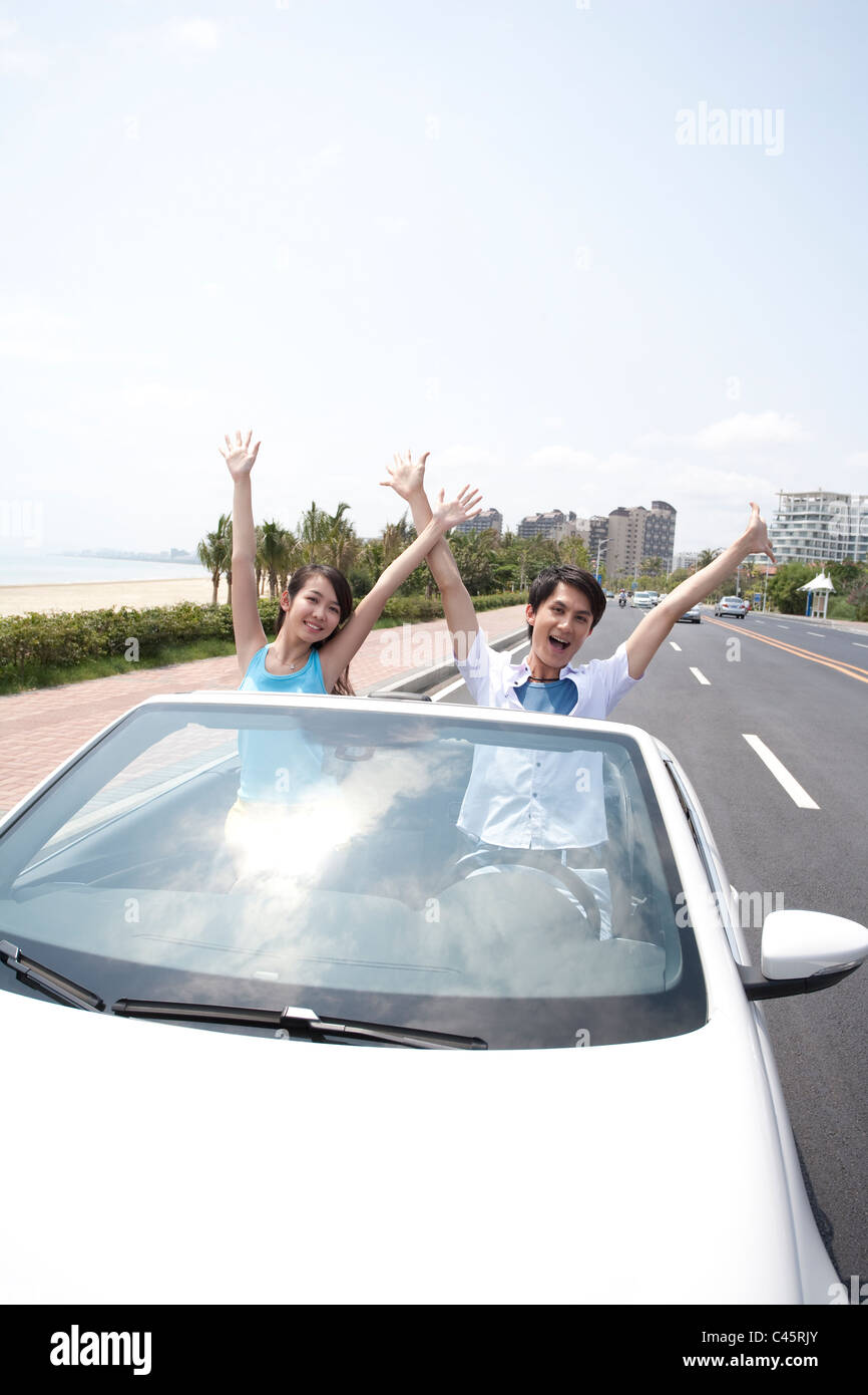 Young People Having Fun in a Convertible Stock Photo - Alamy