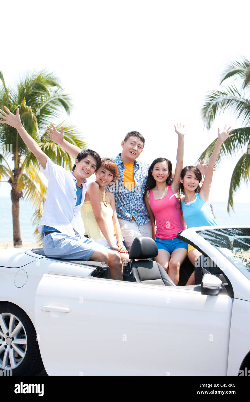 Friends Having Fun in a Convertible Stock Photo - Alamy