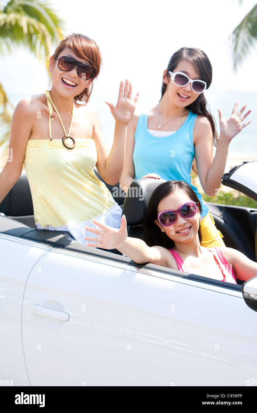 Girlfriends Having Fun in a Convertible Stock Photo - Alamy