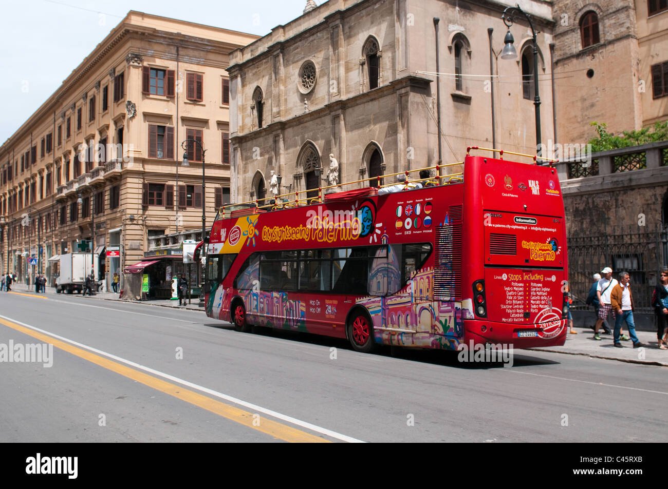 Tourist bus on street of Palermo. Crowds of tourists visit Palermo - a ...