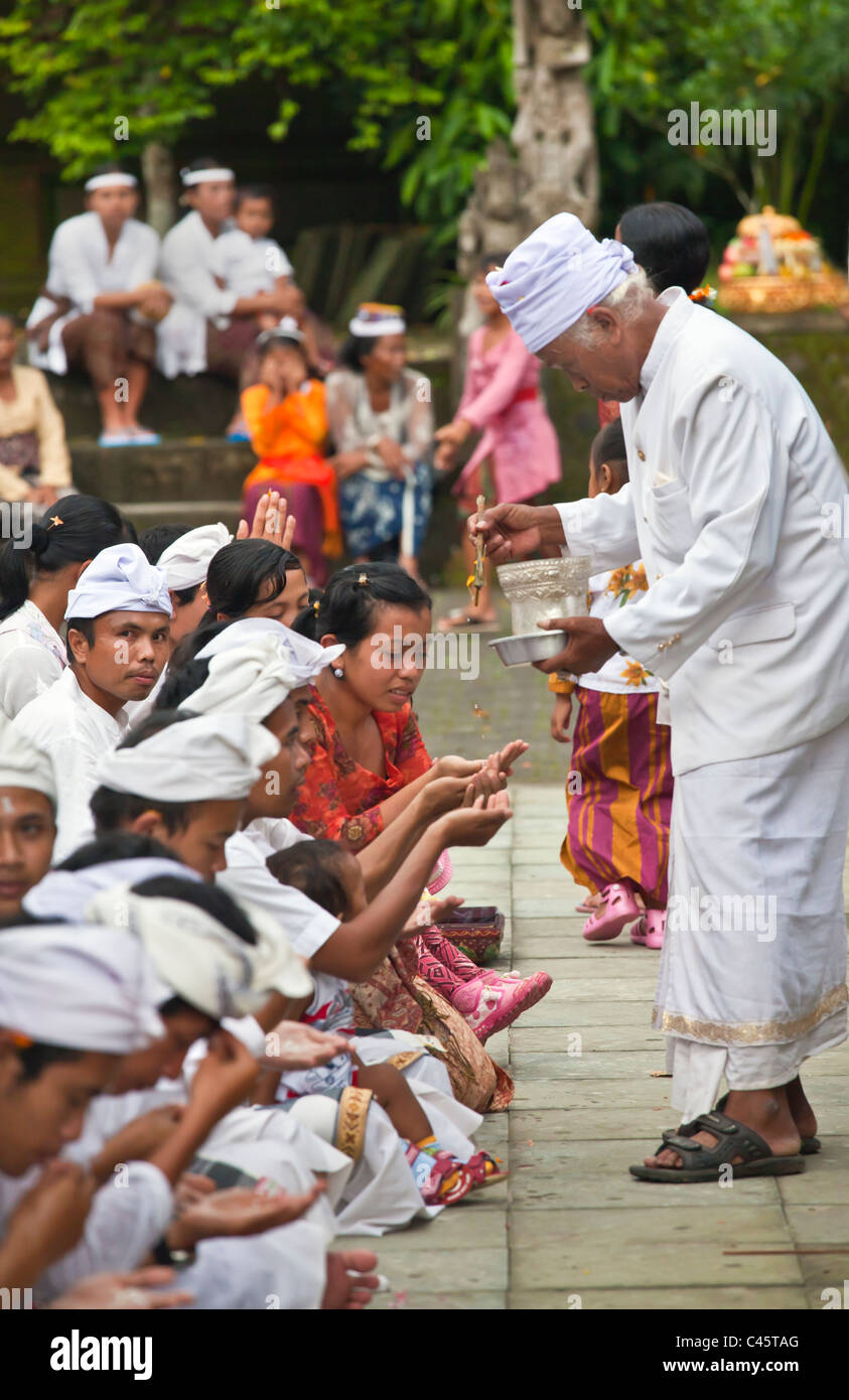 A Hindu crowd worships at the PURA TIRTA EMPUL TEMPLE COMPLEX during ...
