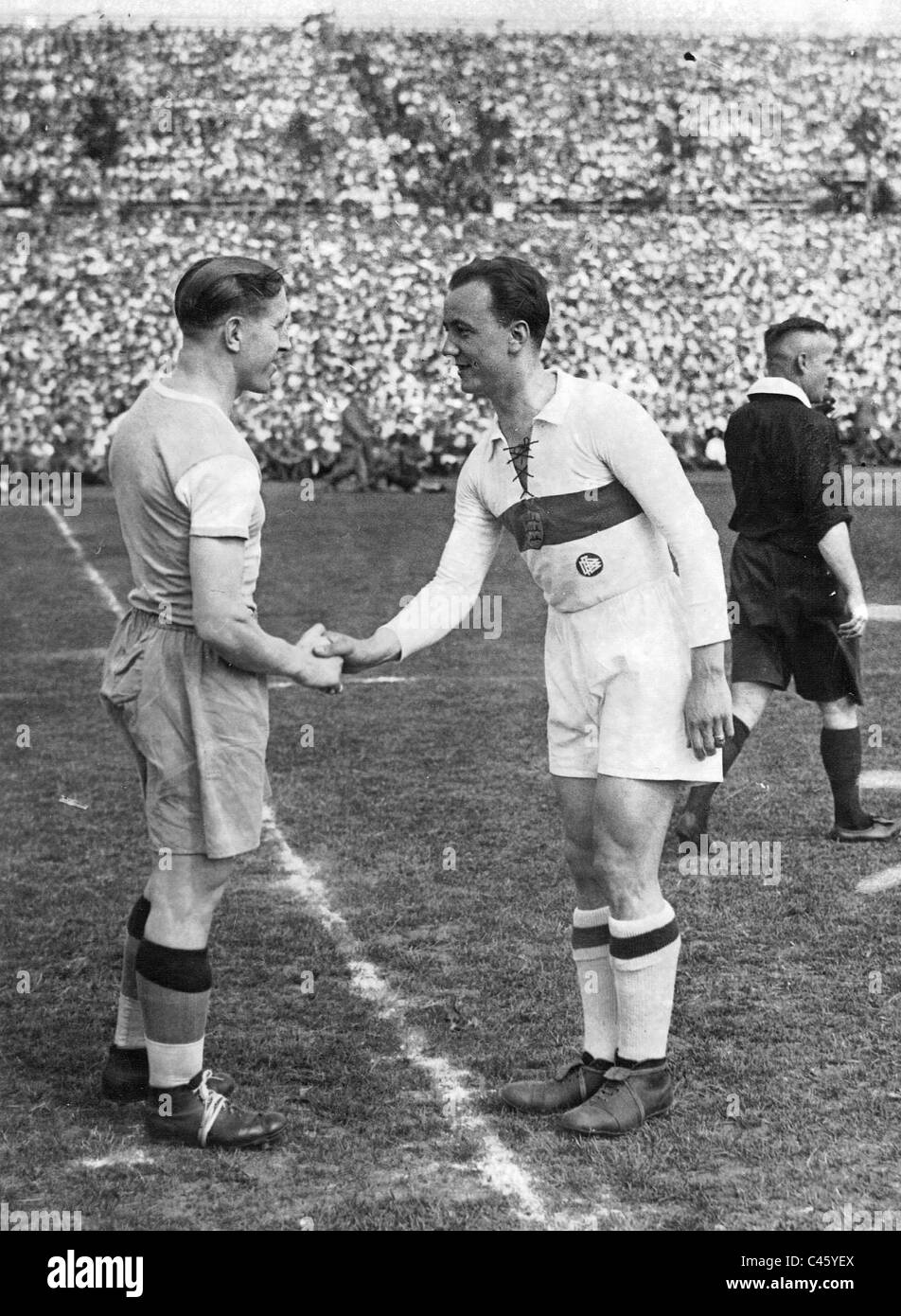 Shake hands soccer Black and White Stock Photos & Images - Alamy