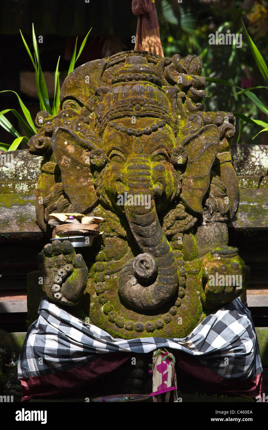 A stone statue of the Hindu deity GANESH - UBUD, BALI, INDONESIA Stock ...