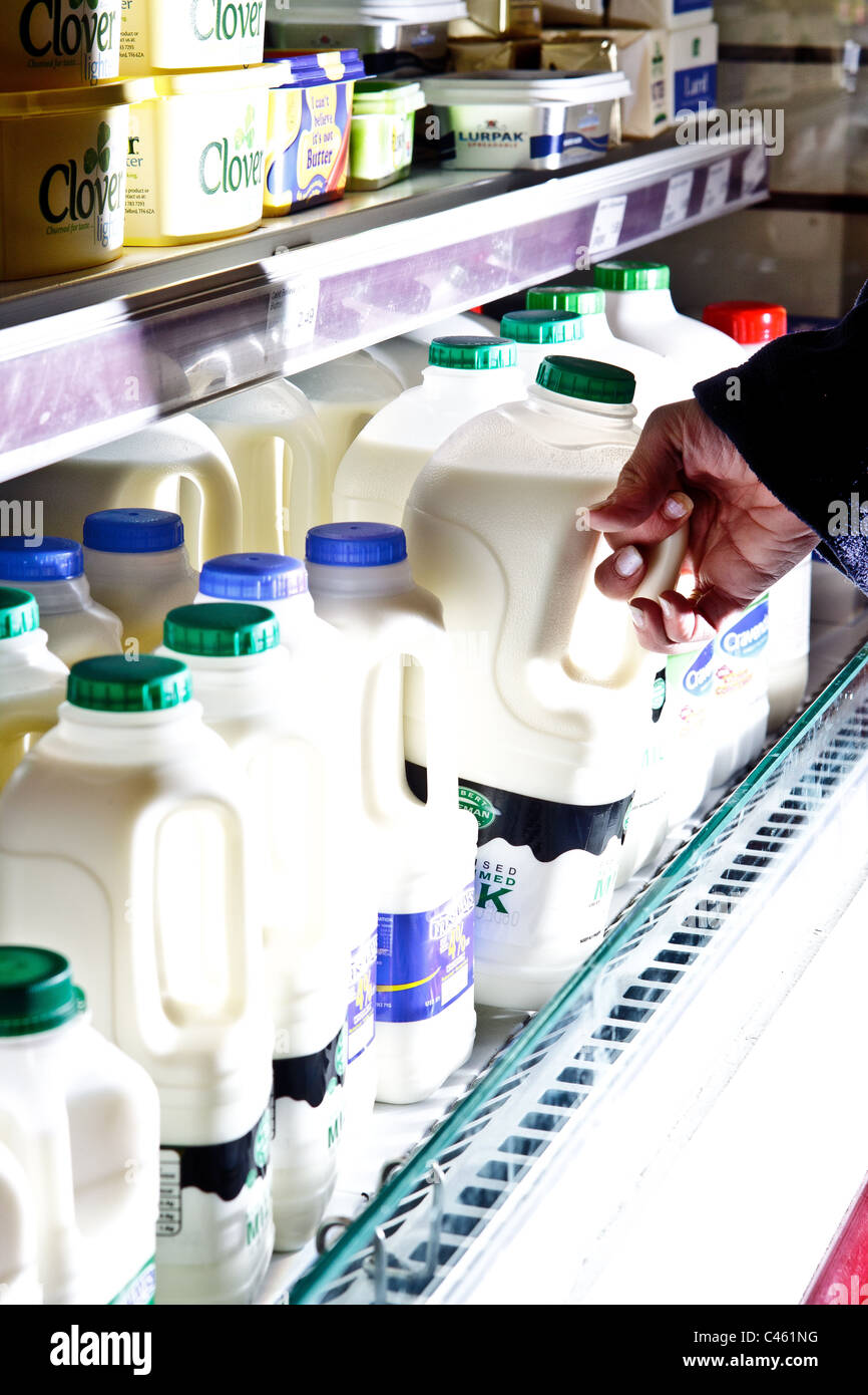 Picking up some milk from a convenience store Stock Photo - Alamy