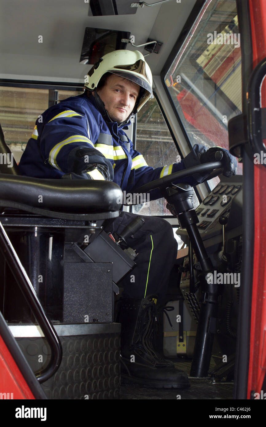 fireman in the car Stock Photo - Alamy