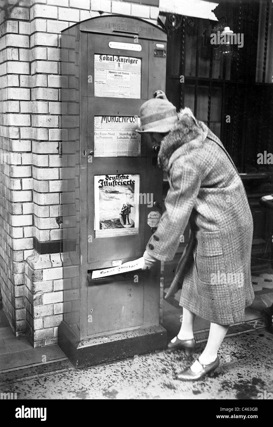 Newspaper vending machine, 1928 Stock Photo - Alamy