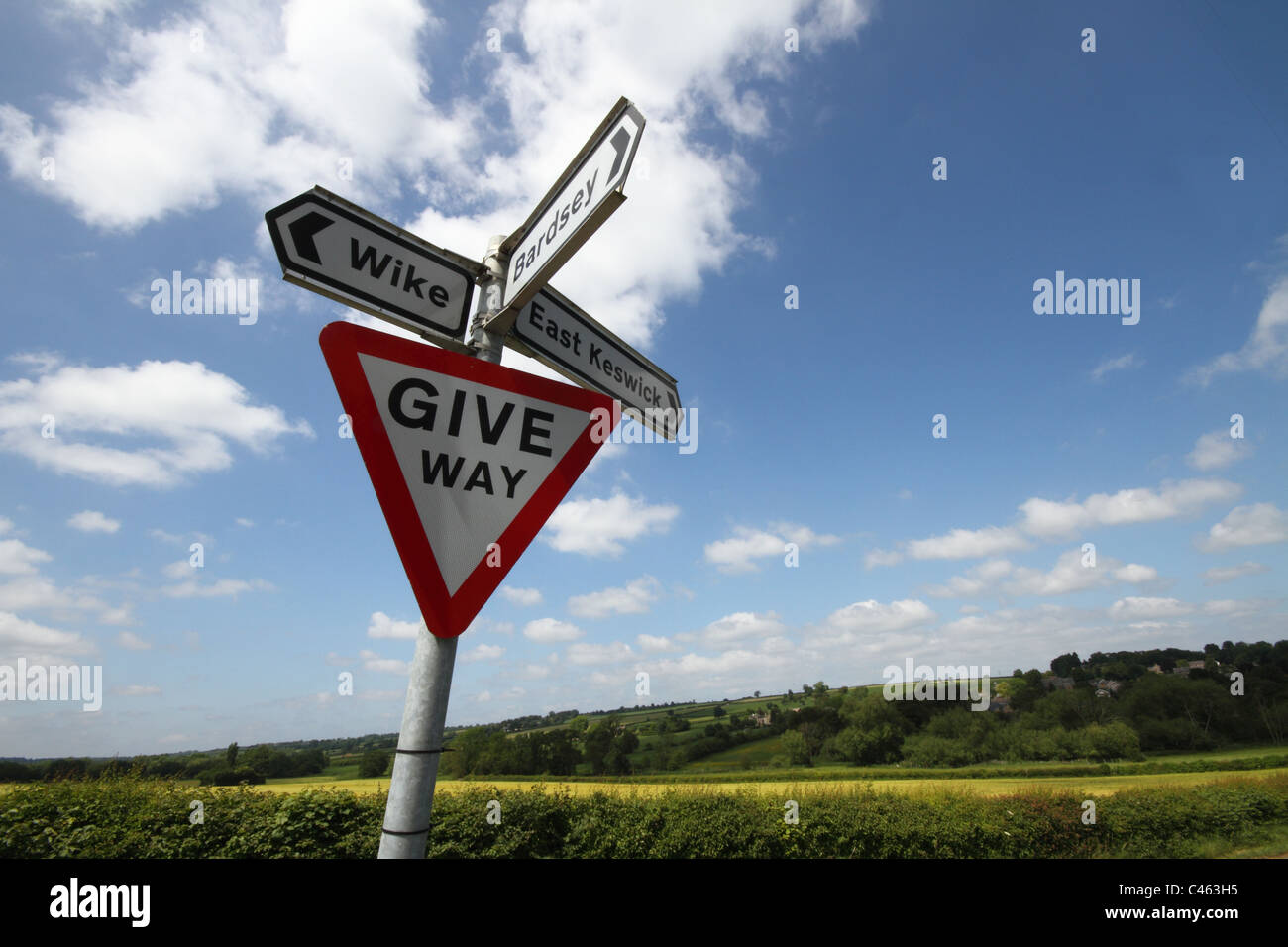 Give way sign, or crossroads, Near Keswick, Leeds Stock Photo - Alamy