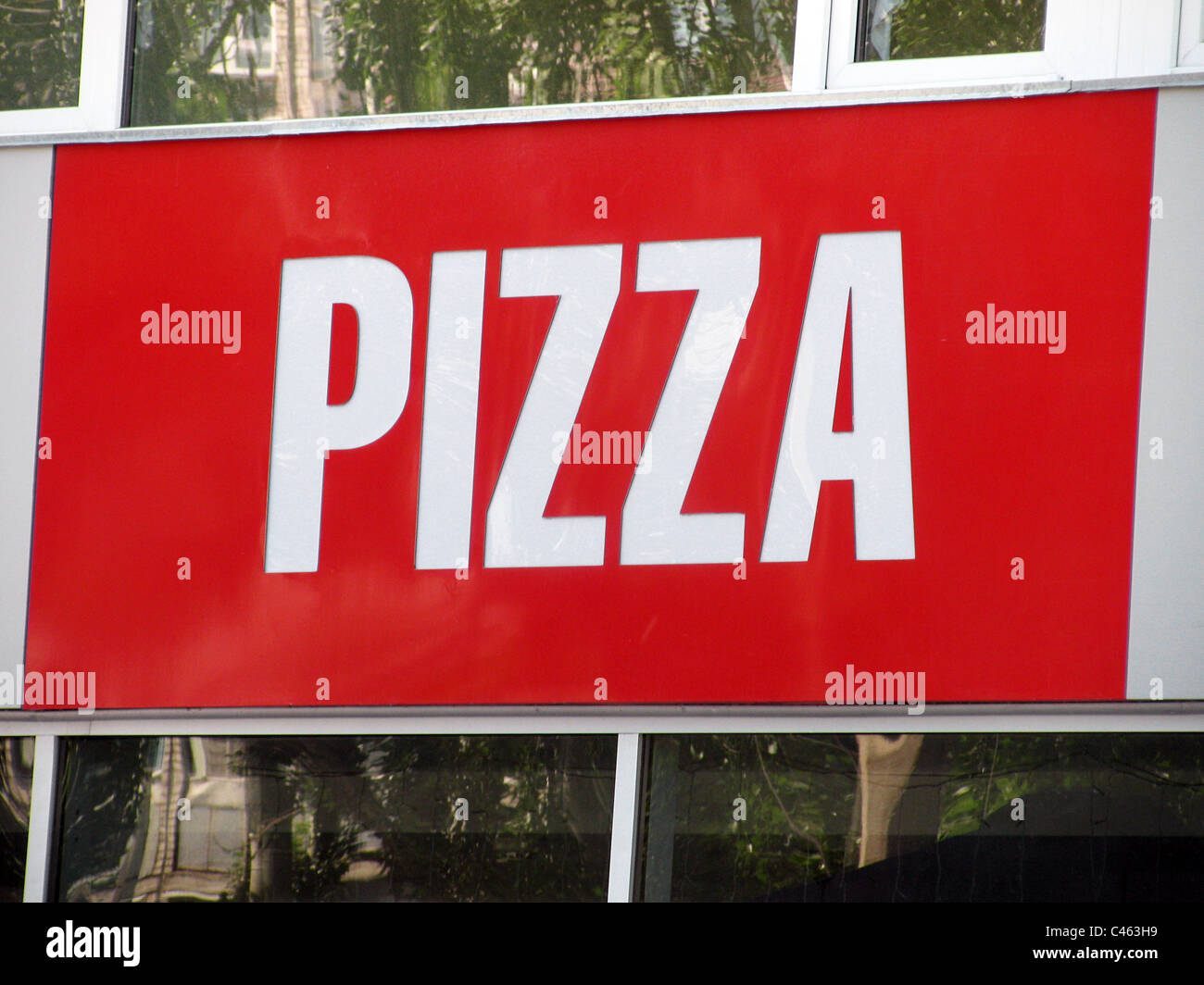 red Pizza signboard with white letters Stock Photo - Alamy