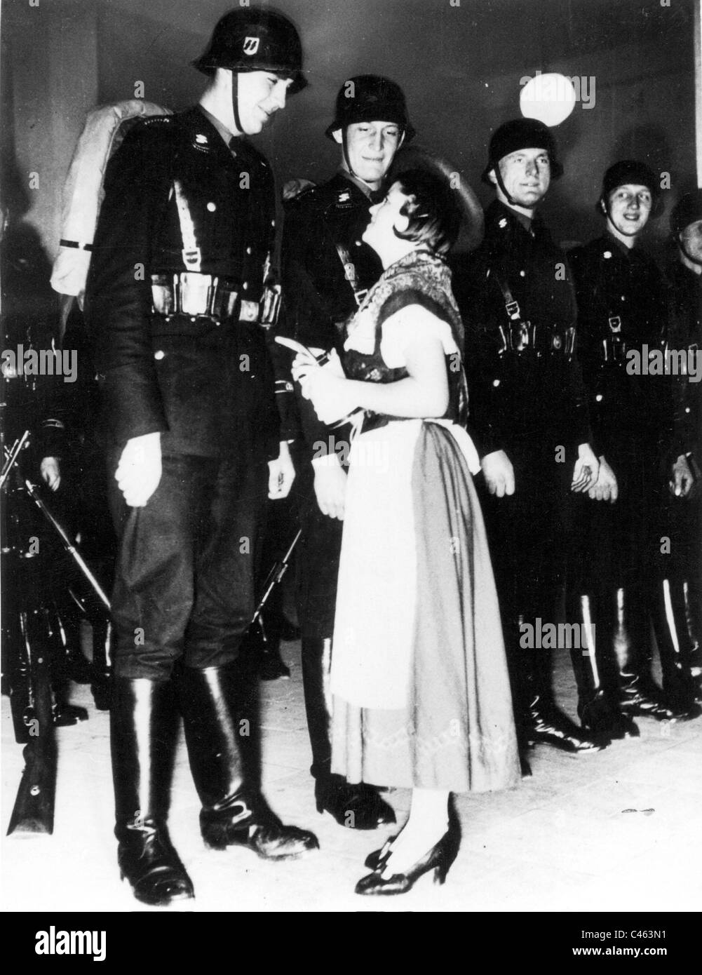 SS Bodyguard Regiment 'Adolf Hitler' admired by an Austrian girl Stock ...