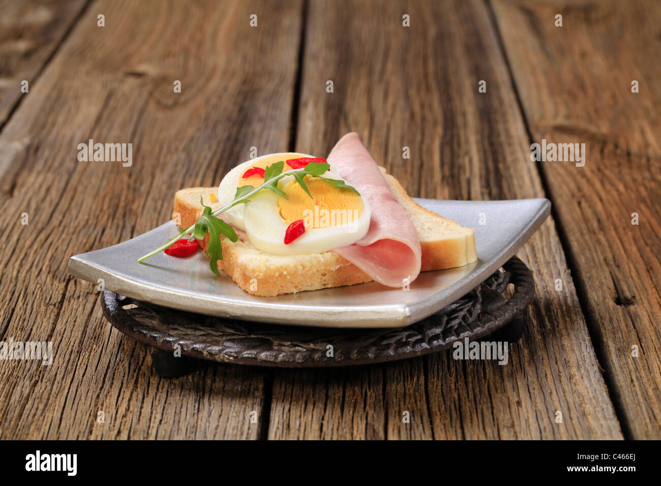 White bread with boiled egg and ham Stock Photo - Alamy