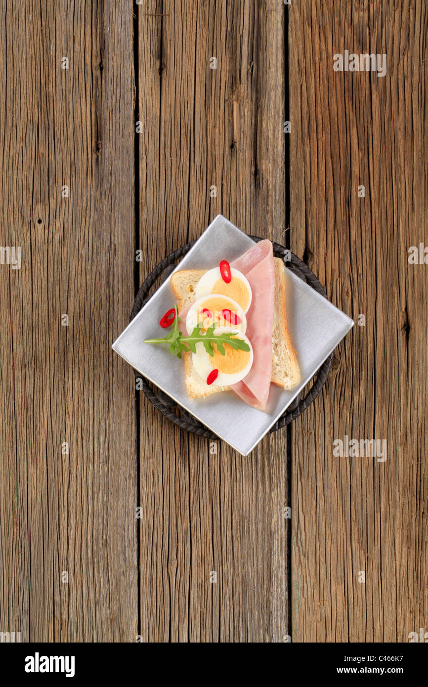 White bread with boiled egg and ham Stock Photo - Alamy