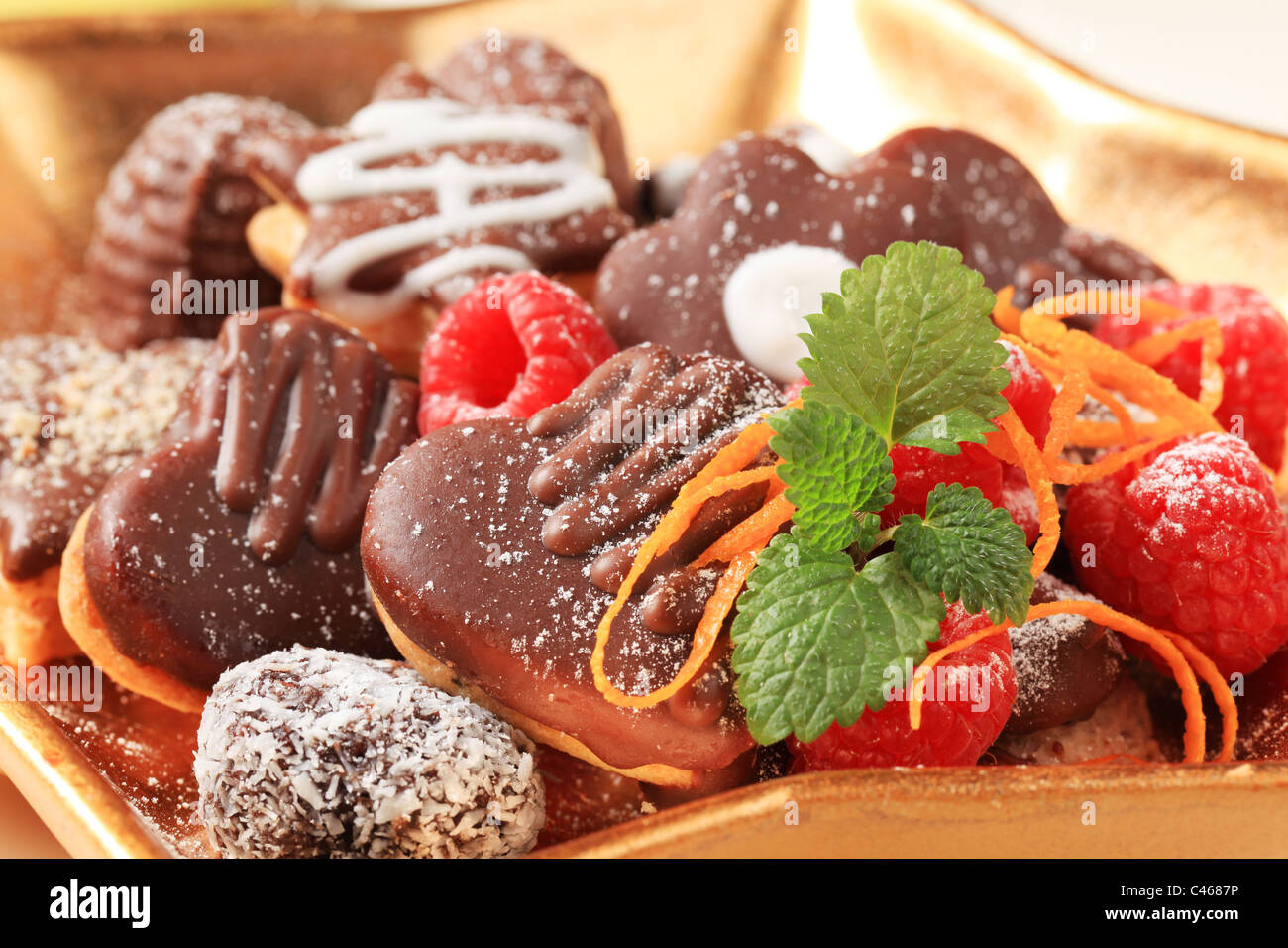 Variety of cookies with chocolate icing - detail Stock Photo - Alamy