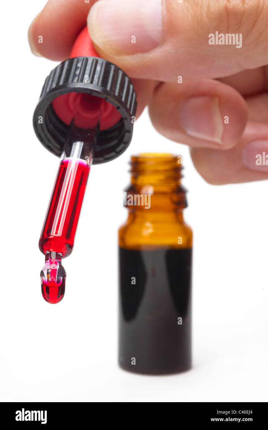 poison fluid in brown bottle Stock Photo - Alamy