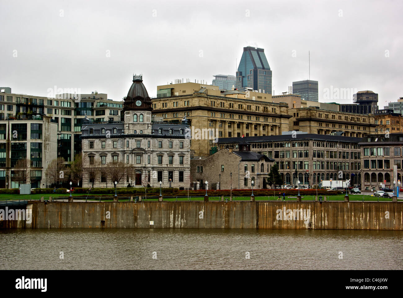 Buildings along old Montreal riverfront rainy overcast skies Stock ...
